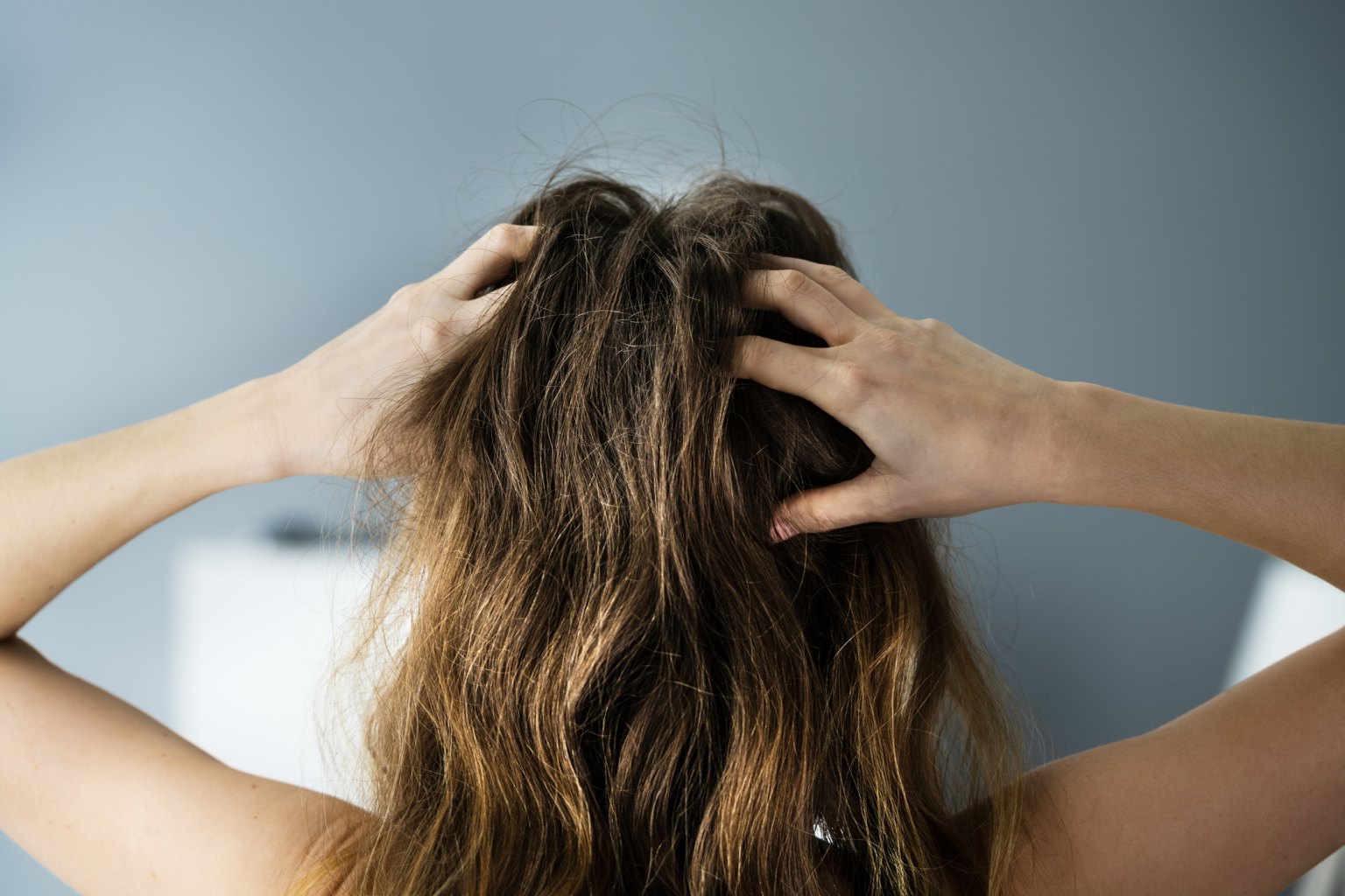 Why Does My Scalp Smell? Dermatologists' 6 Top Reasons | Woman's World