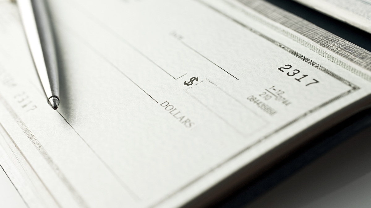 USAA Class Action Settlement Details: How to Claim | Woman's World