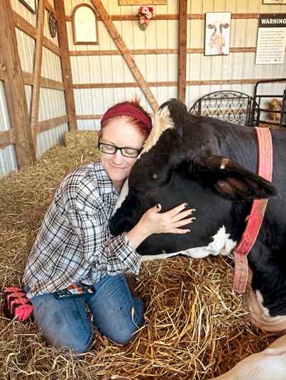 Cow Cuddling Is the Joyful Trend Everyone’s Talking About | Woman's World